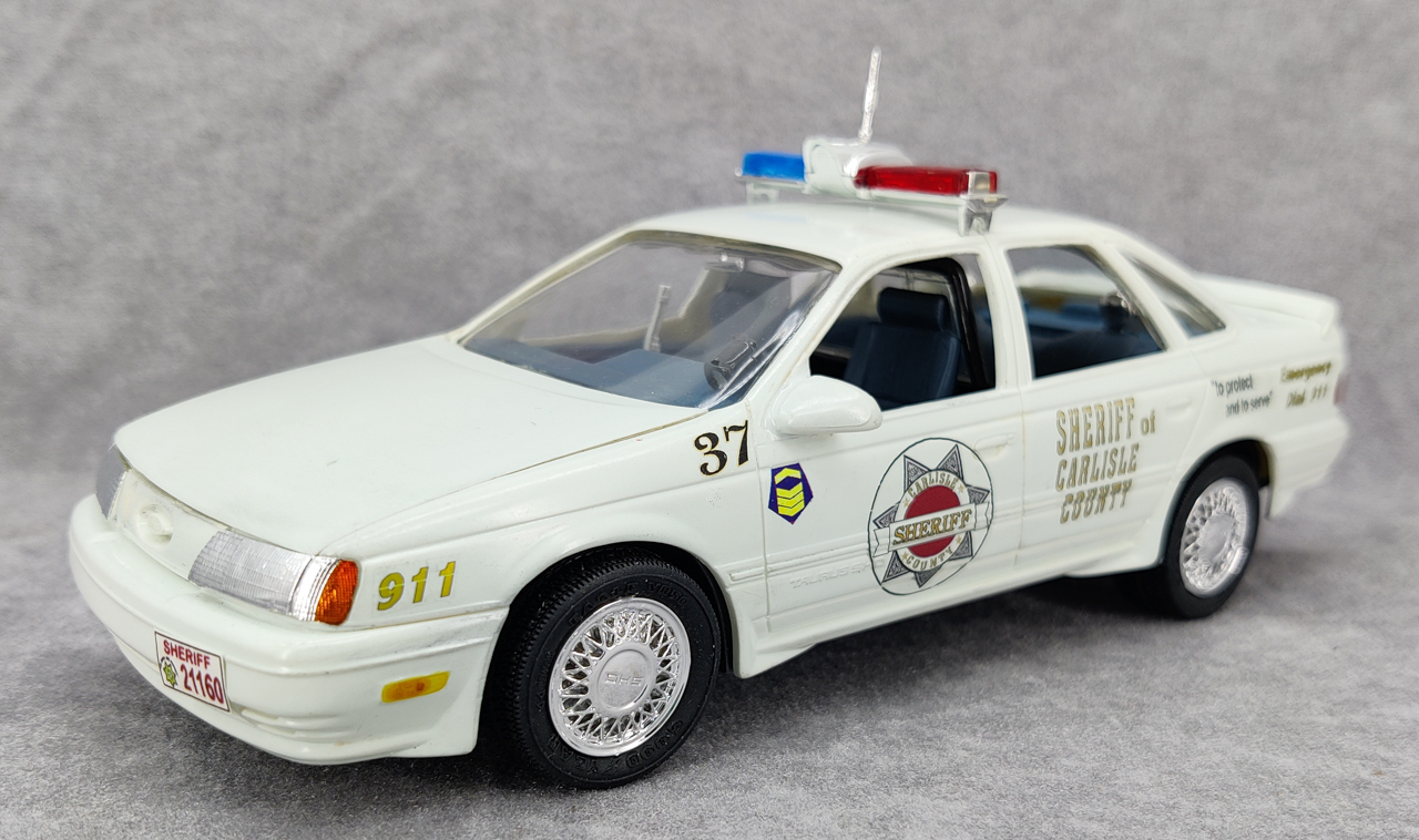 AMT 1989-1991 Ford Taurus SHO Police Built Kit - Spotlight Hobbies
