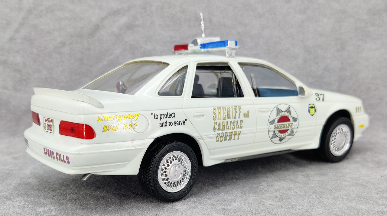 AMT 1989-1991 Ford Taurus SHO Police Built Kit - Spotlight Hobbies