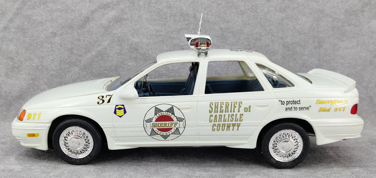 AMT 1989-1991 Ford Taurus SHO Police Built Kit - Spotlight Hobbies