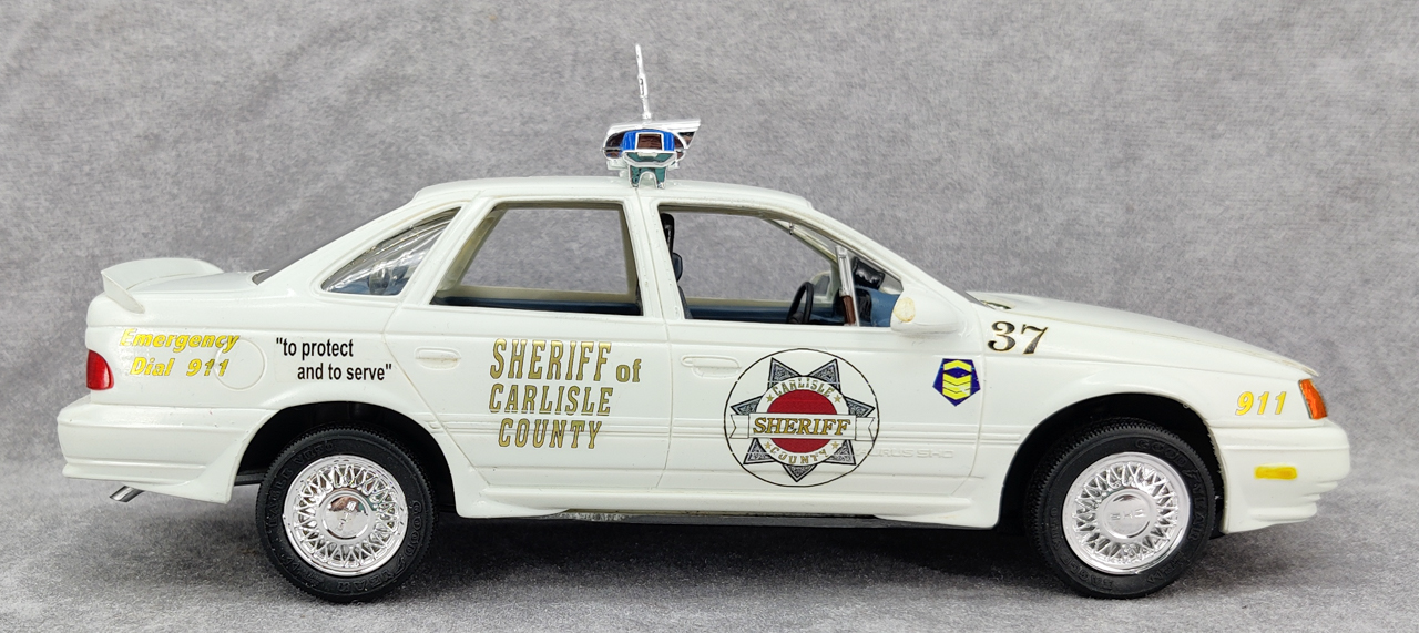 AMT 1989-1991 Ford Taurus SHO Police Built Kit - Spotlight Hobbies